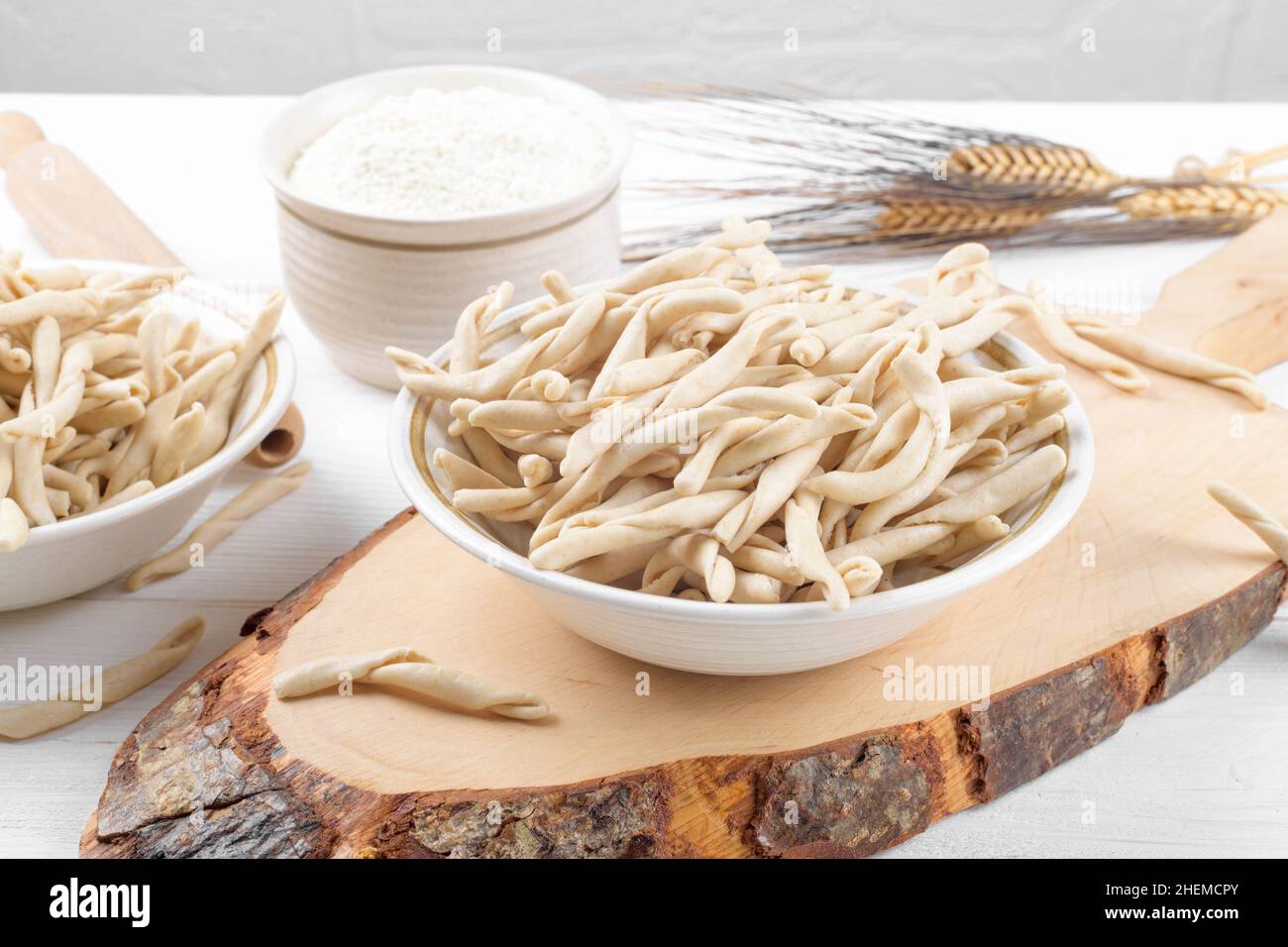 Whole grain wheat raw apulian pasta called Pizzarieddi or maccaruni on ...