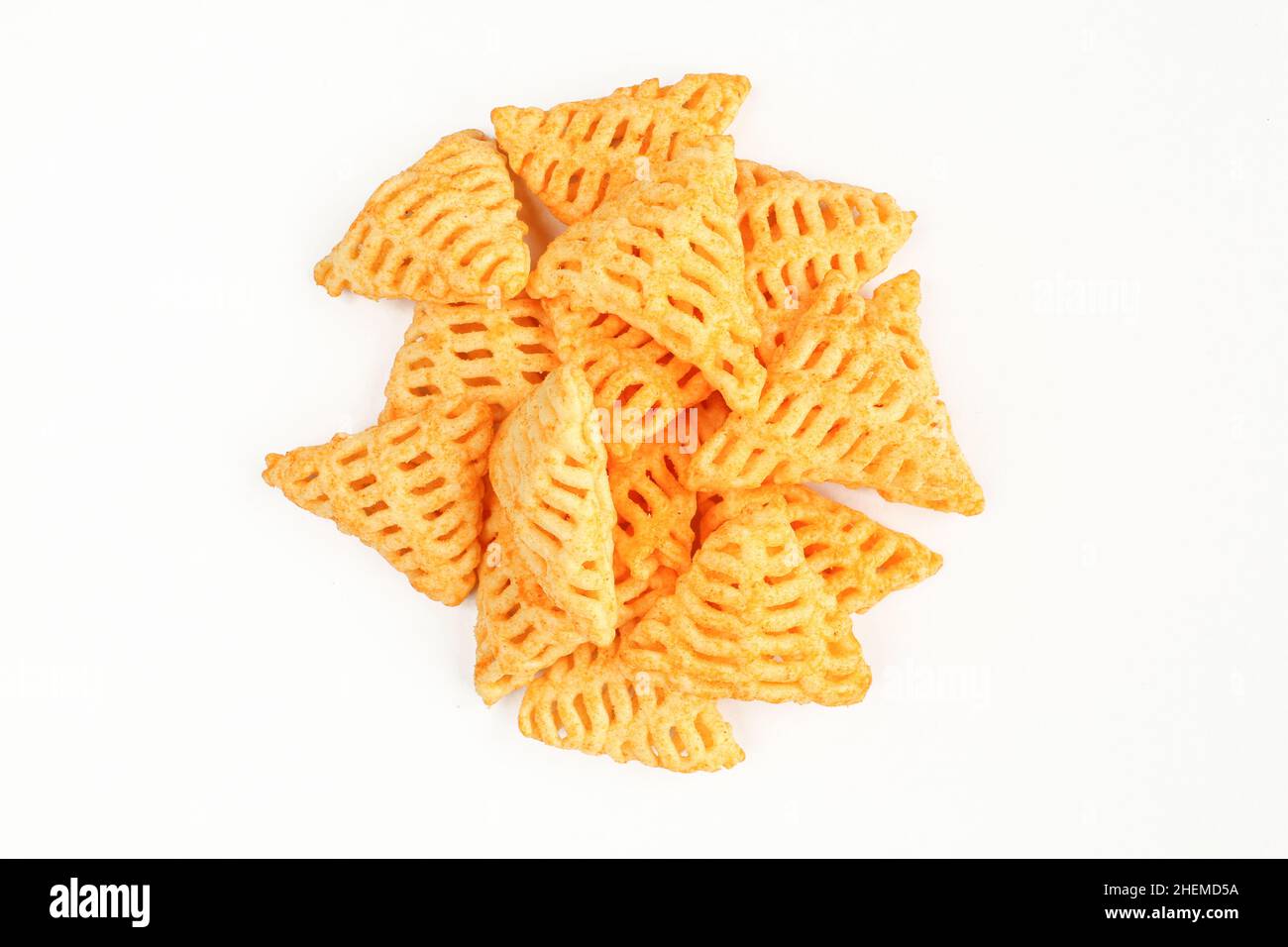Pile of crispy triangle shaped snack isolated on white background Stock ...