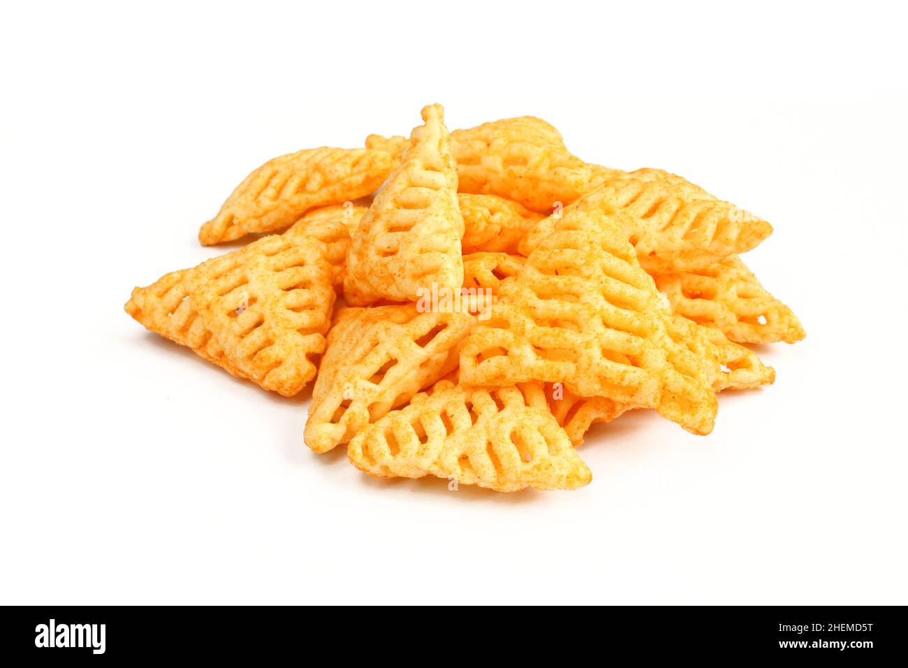Pile of crispy triangle shaped snack isolated on white background Stock ...