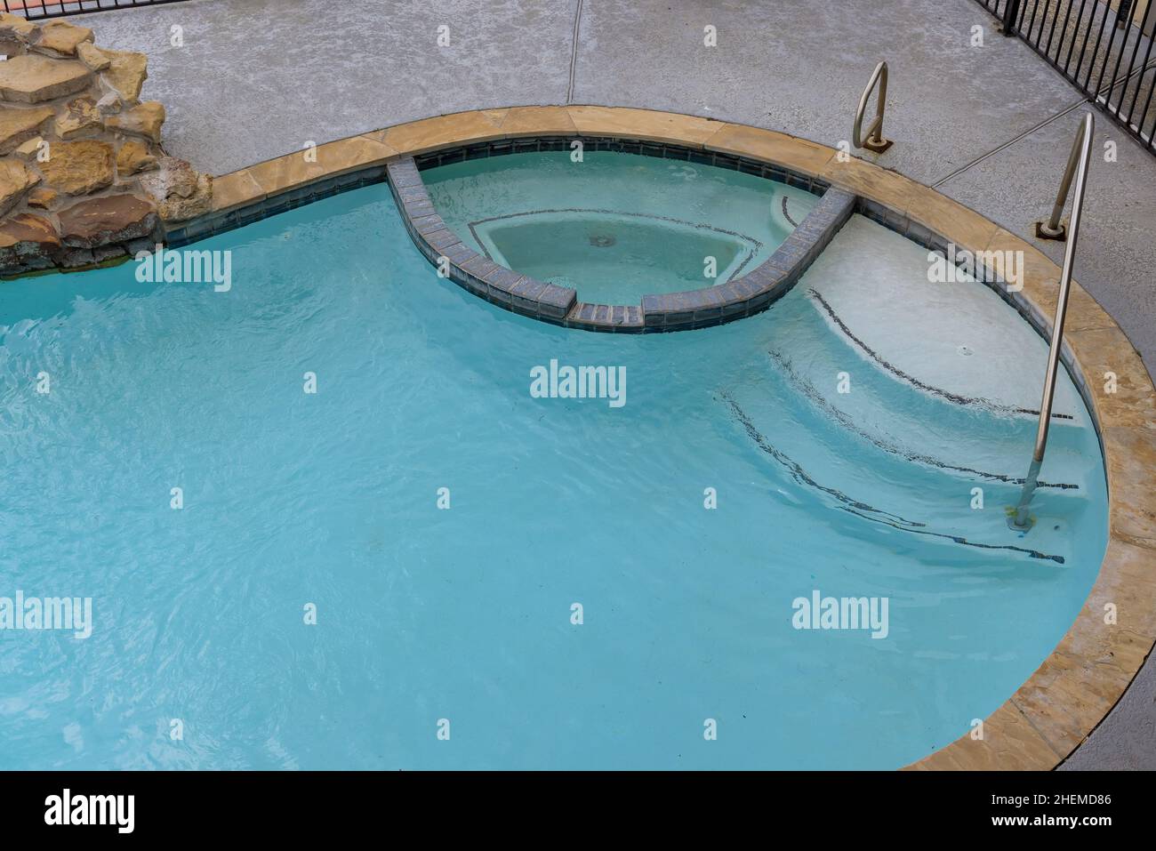 Backyard swimming pool opening with water before cleaning Stock Photo ...