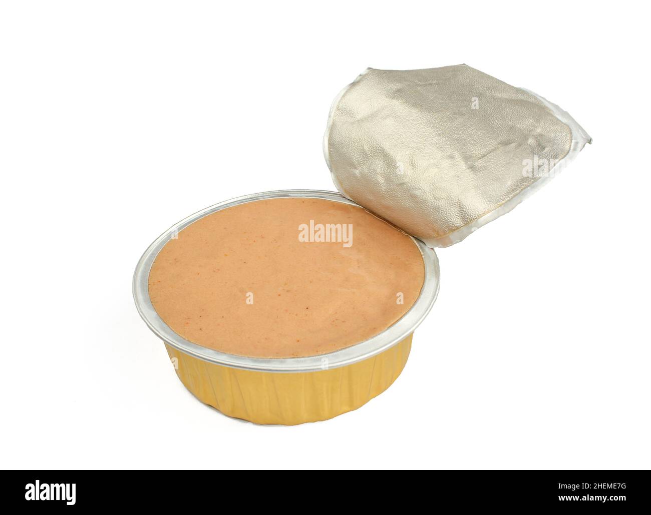 Chicken pate in opened aluminum packaging isolated on white background ...