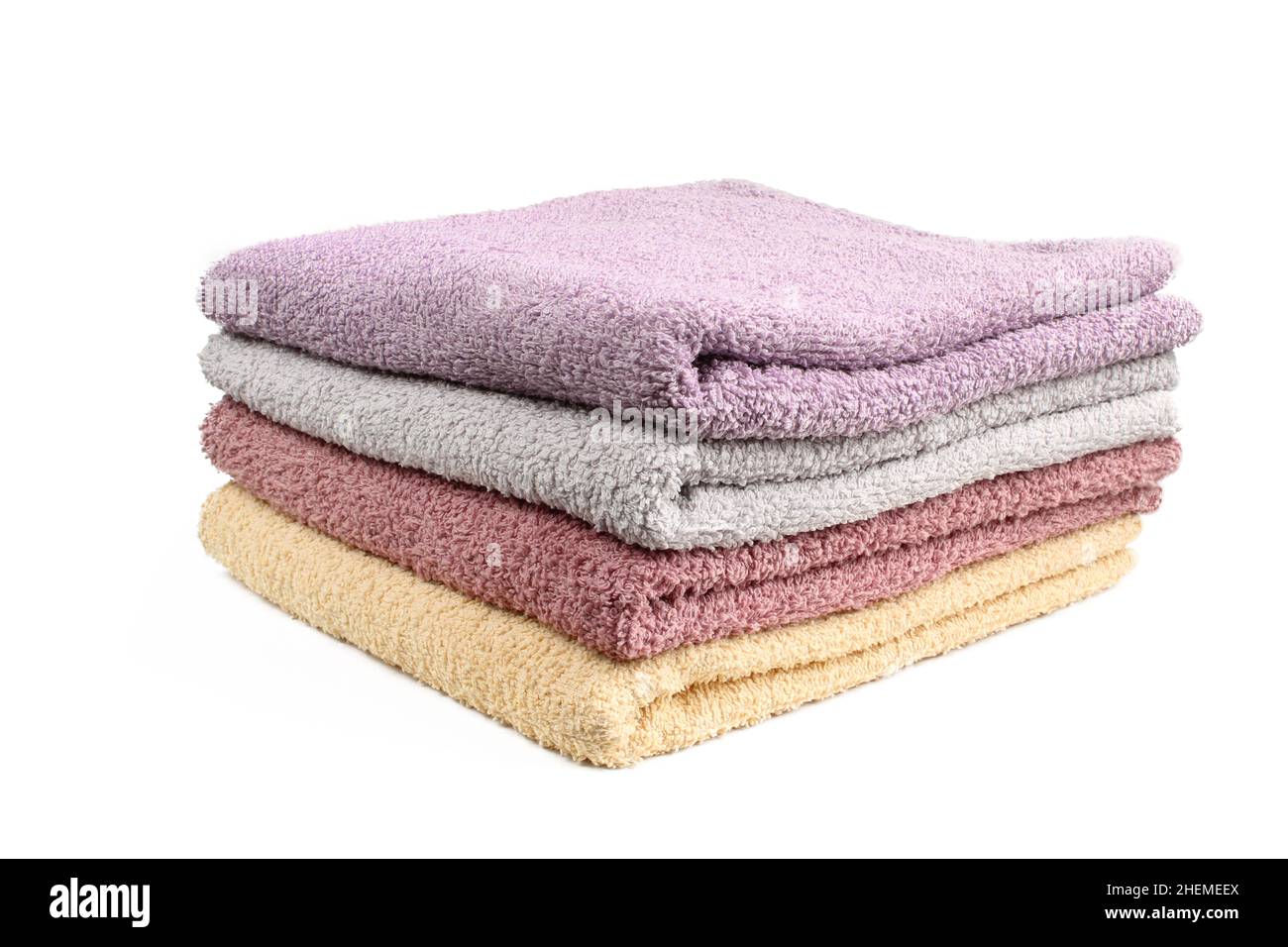 Stack of different color towels isolated on white background Stock ...