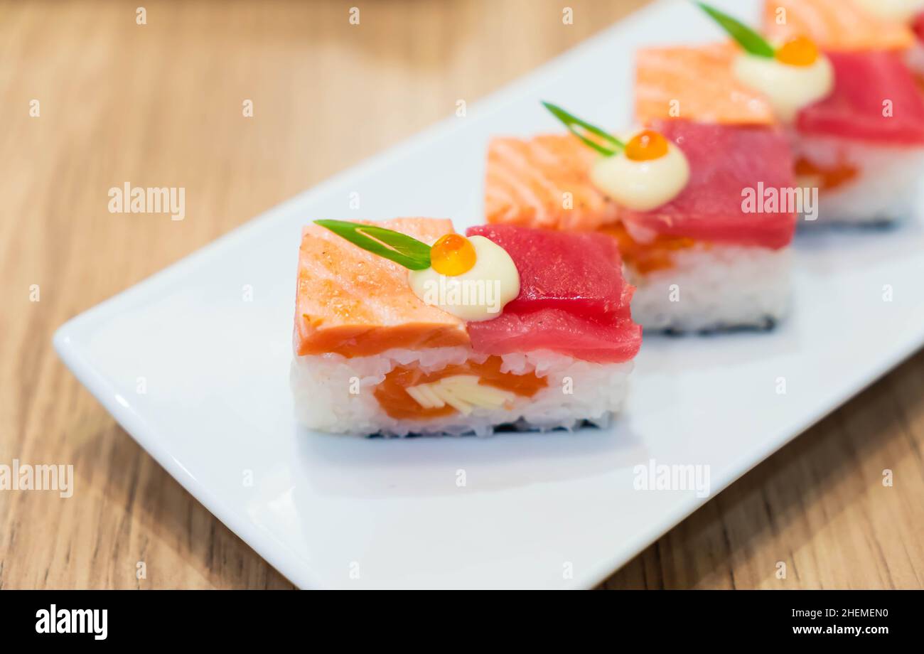 salmon burned and tuna nigiri - japanese food Stock Photo - Alamy