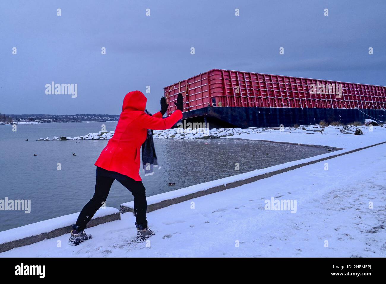 Woman pretending to push Beached barge, Barge Chilling Beach sign, aka ...