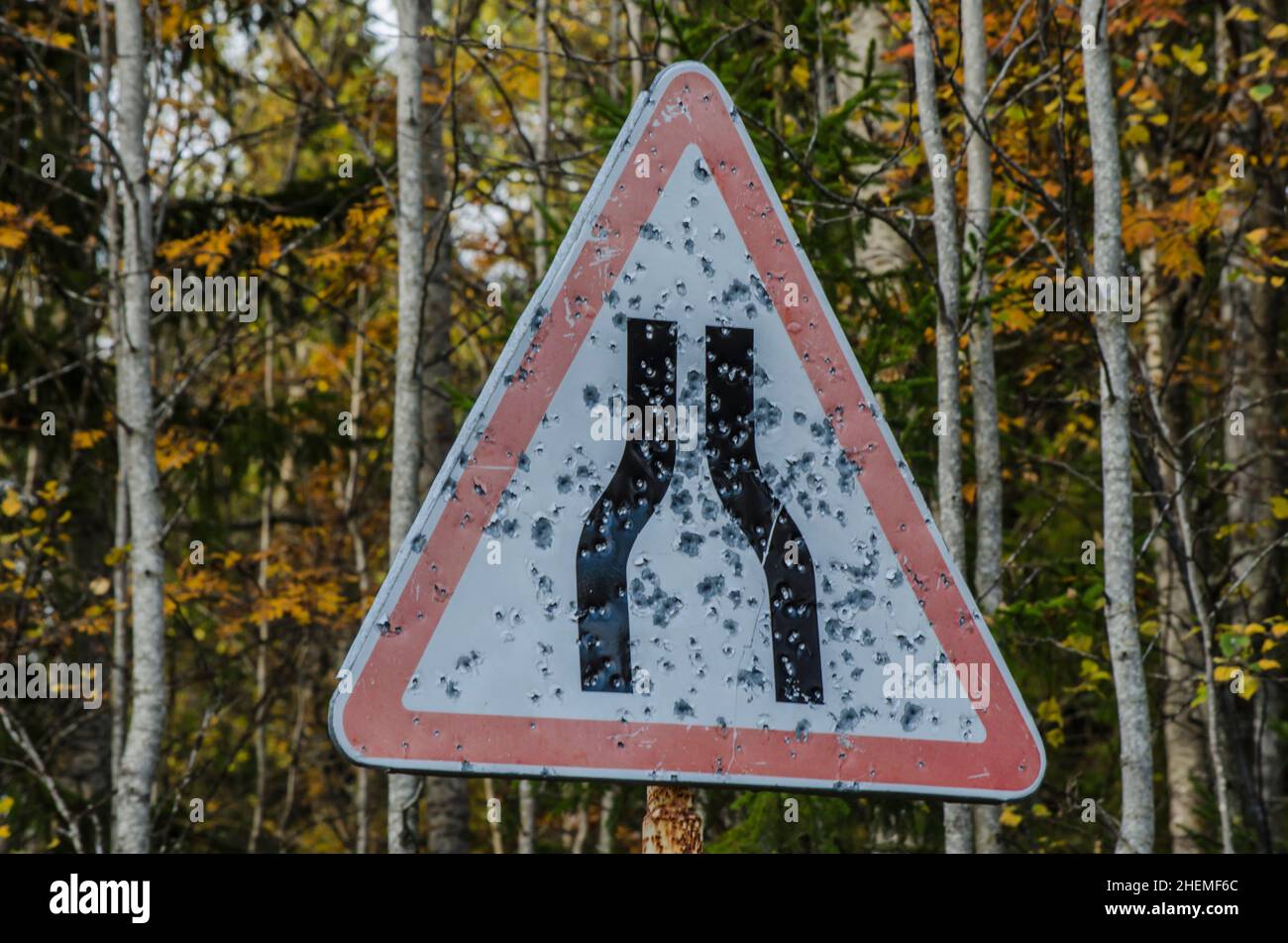 Road sign shot with a gun Stock Photo - Alamy