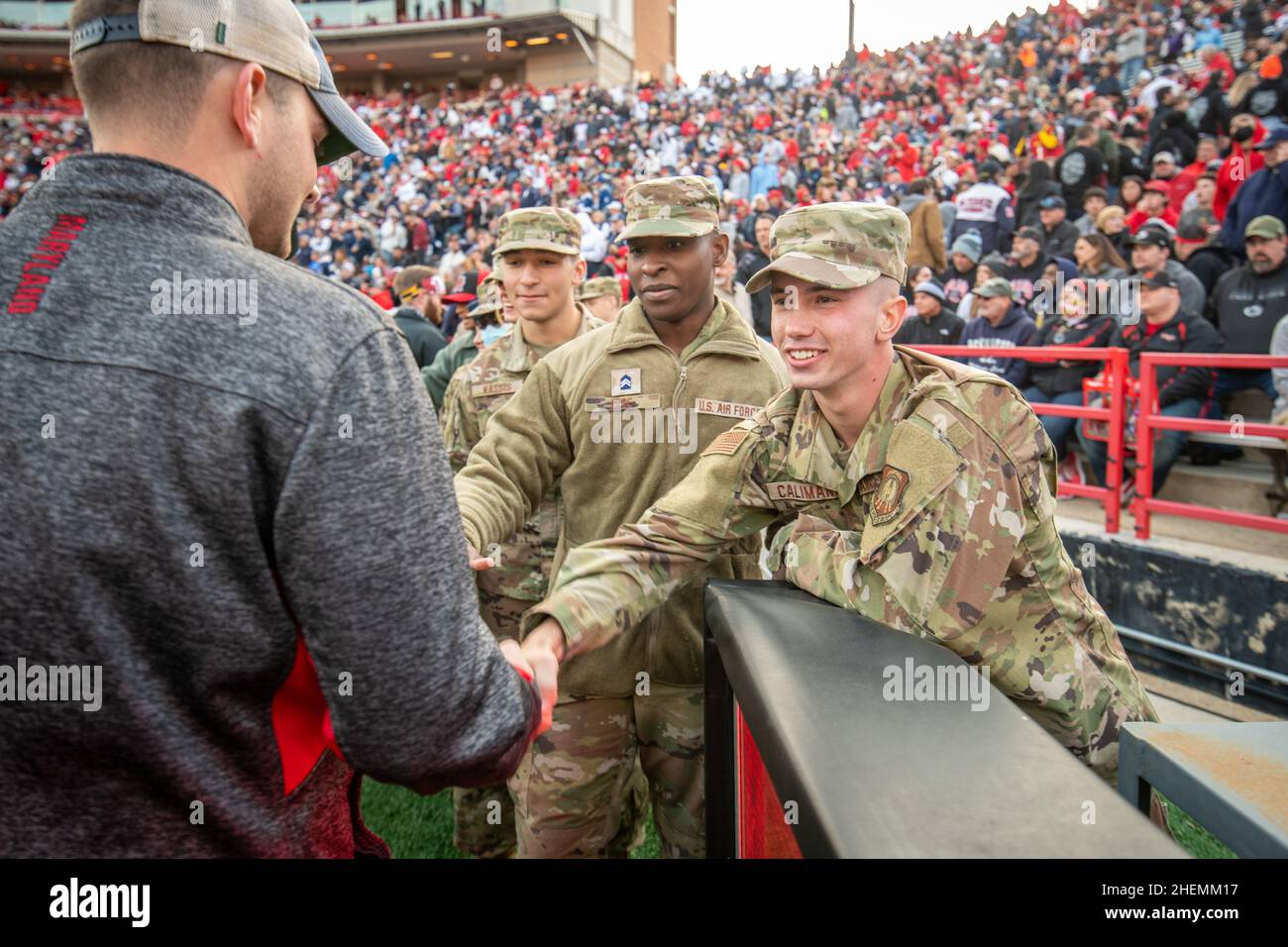 Servicemen in uniform lined up to shake hands Stock Photo - Alamy