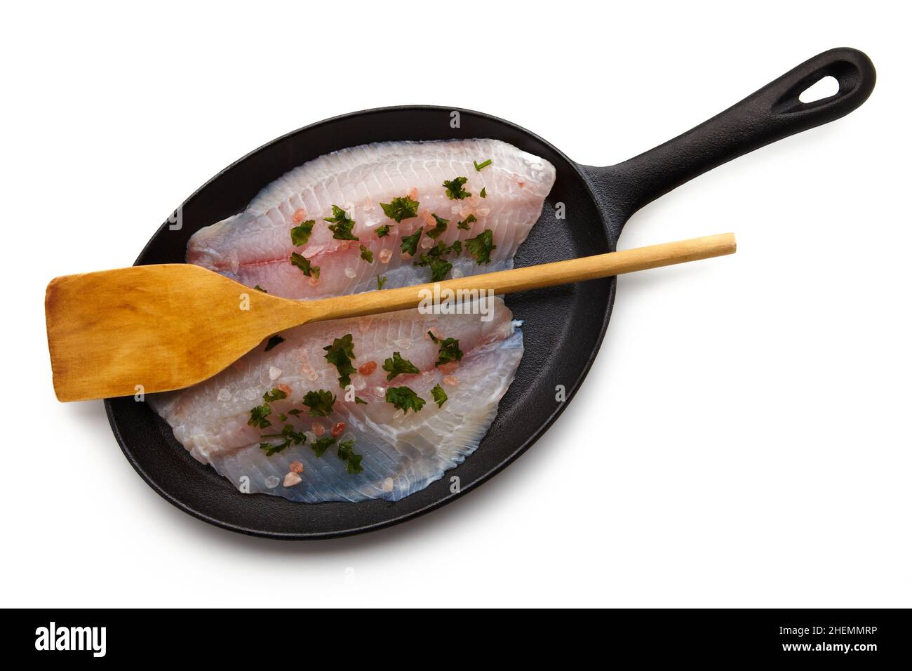 Cook frying fresh fish on Cut Out Stock Images & Pictures - Alamy