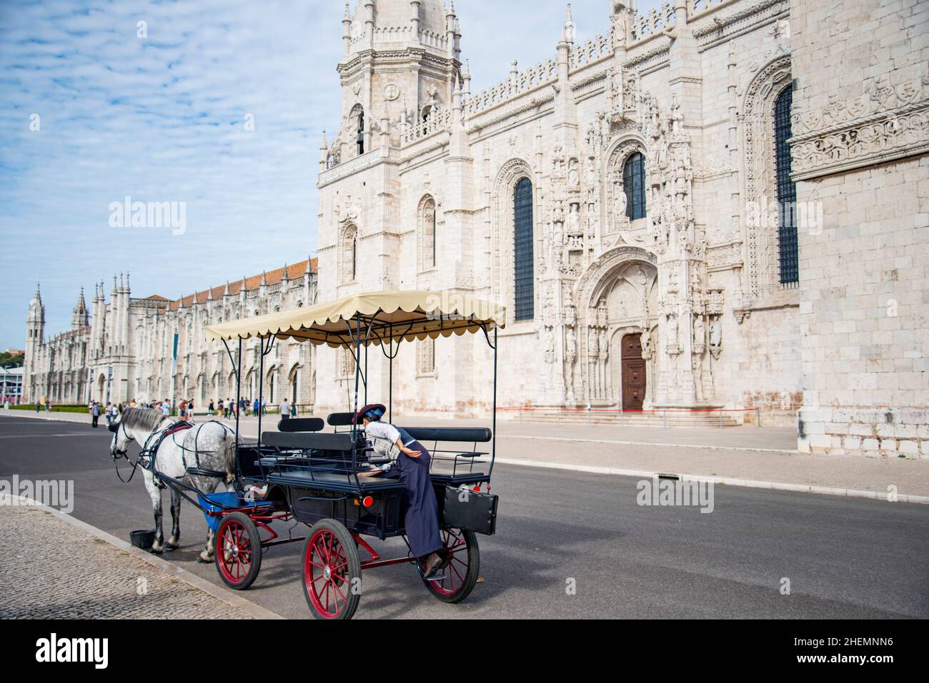 a Horse cart Taxi in front of the Mosteiro dos Jeronimos in Belem near ...