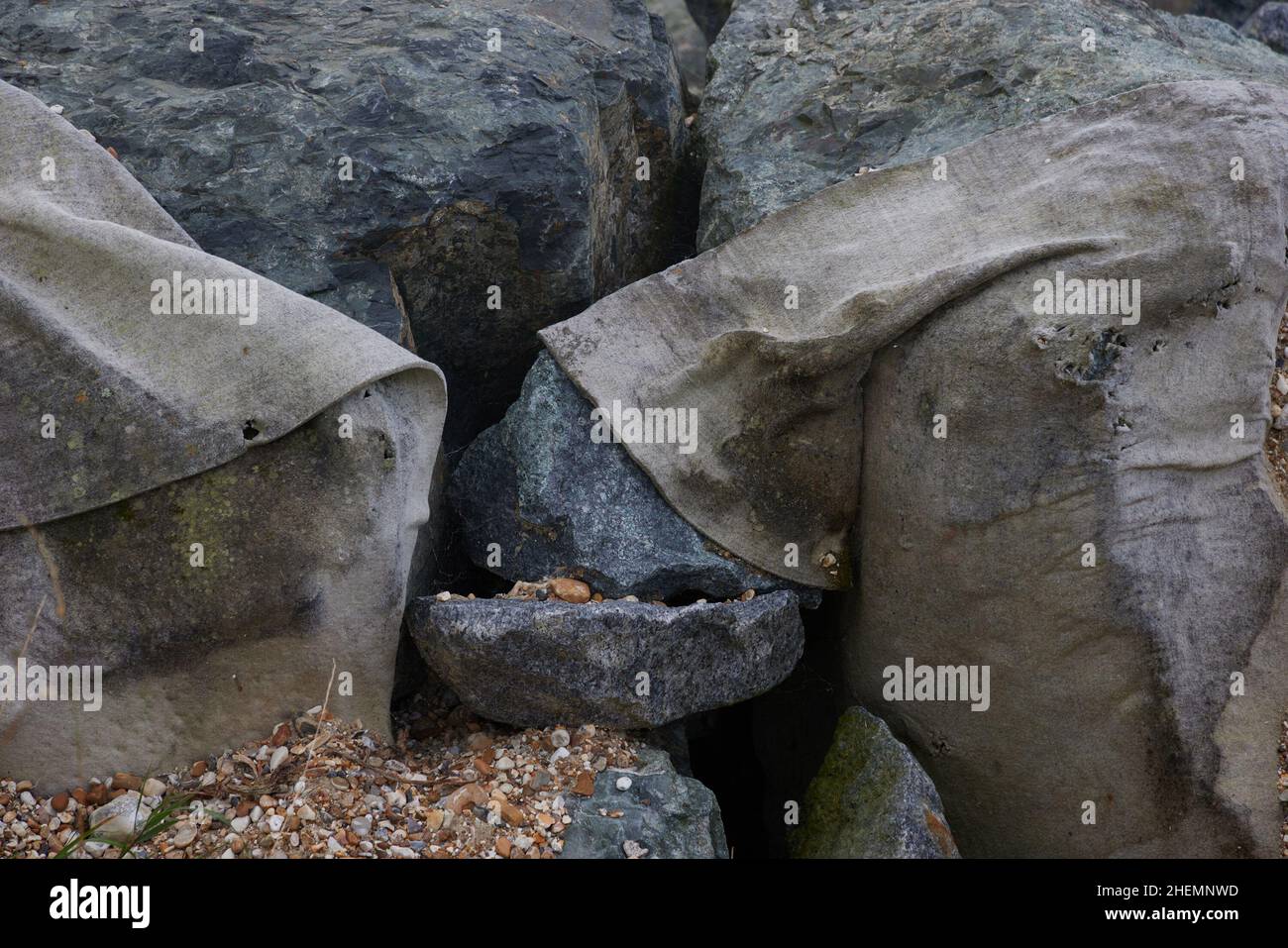 Close up of large rocks used on Aldwick beach to control beach erosion ...