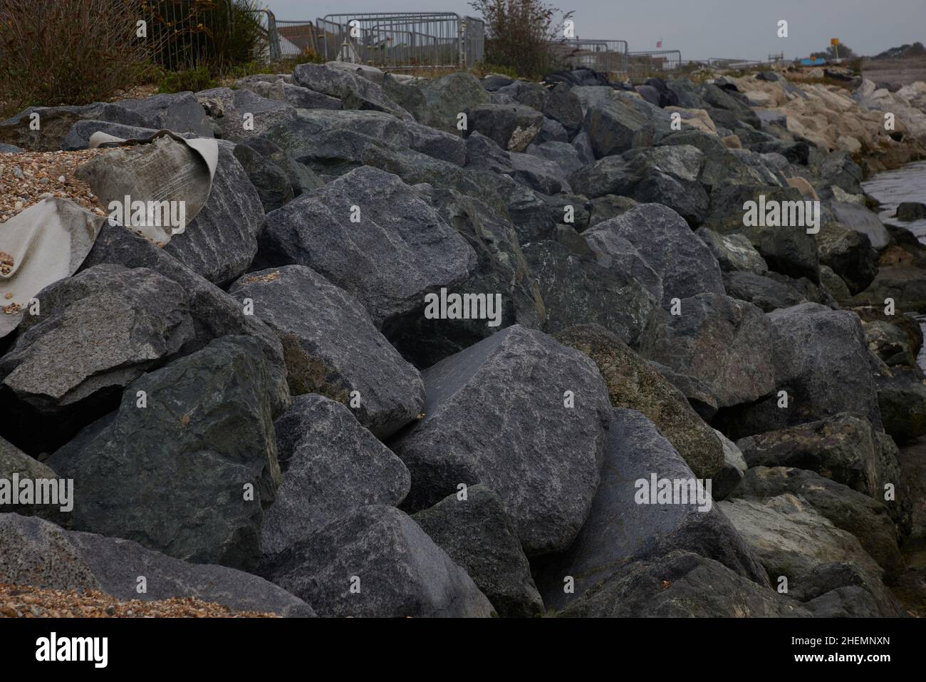 Sea defences of rocks seen on Pagham beach against coastal erosion ...
