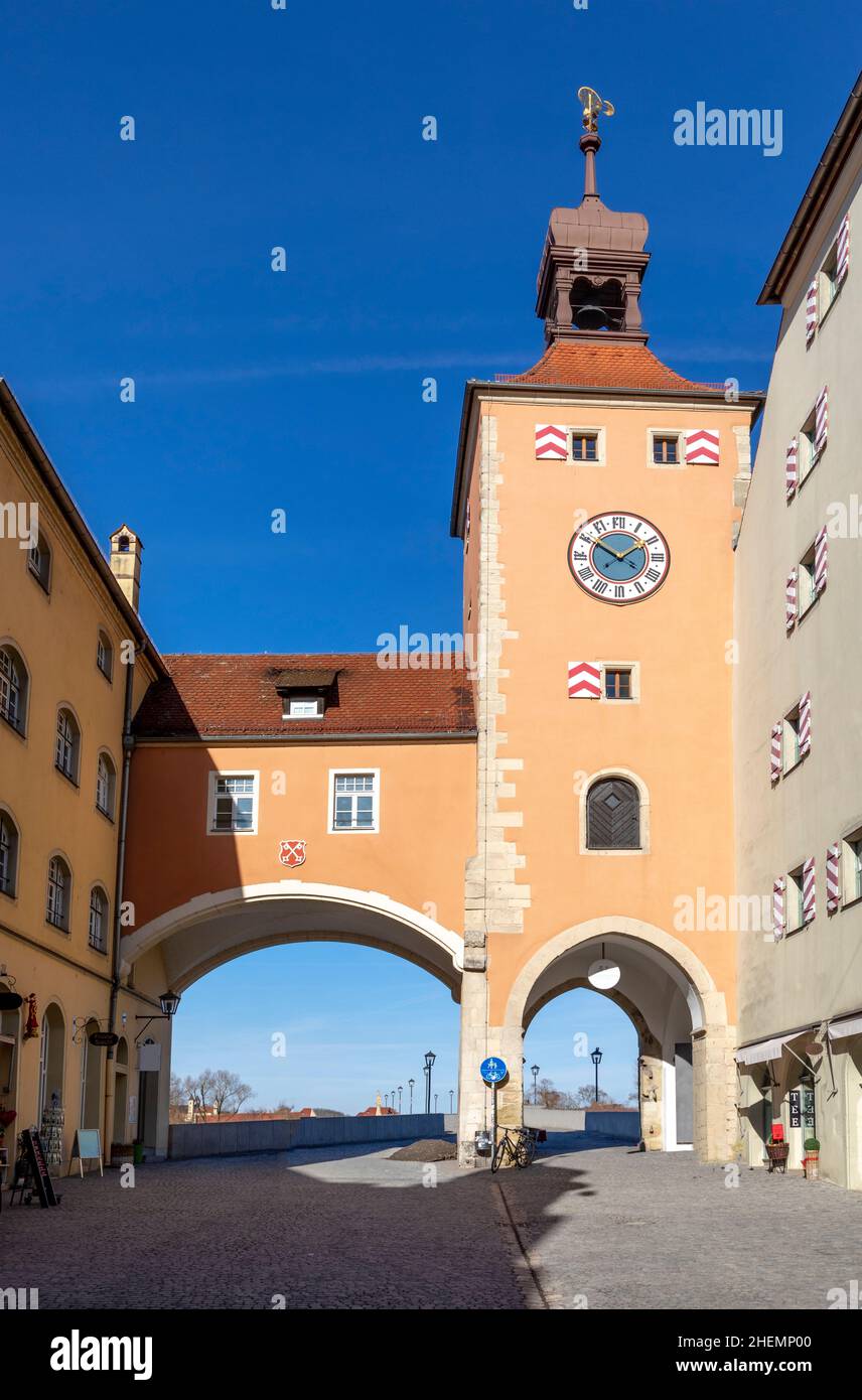 historic bridge tower, gate to old stone bridge crossing river Danube ...