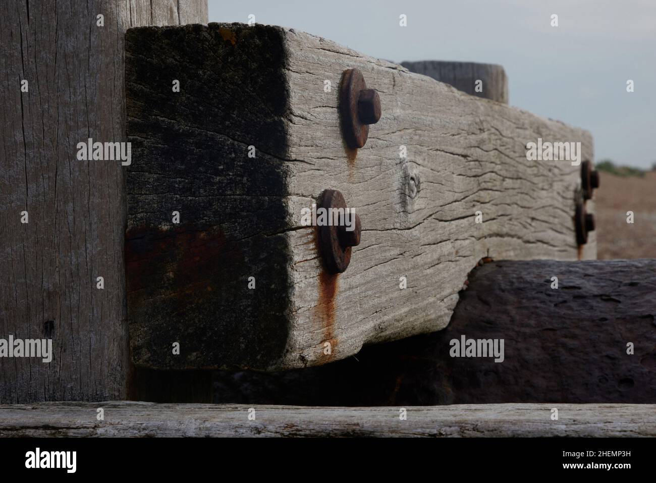 Large wooden beams bolted together Stock Photo - Alamy