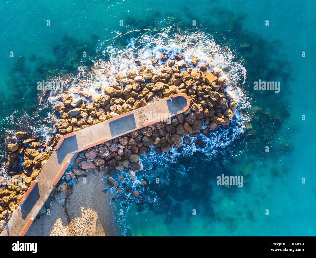 Top down aerial view of breakwater and sea in Liguria Sea, Italy Stock ...