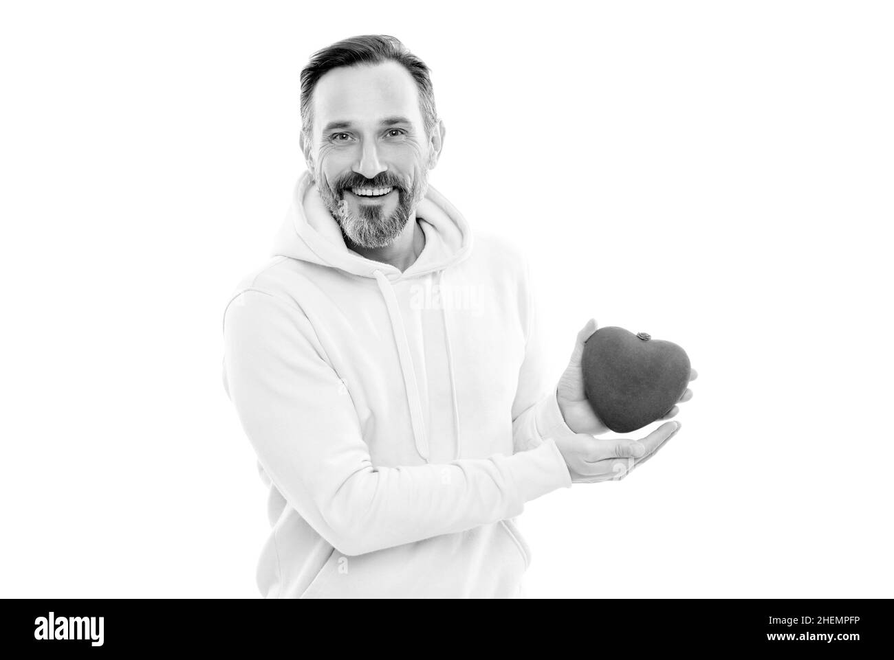 mature happy man with heart shape box. smiling senior guy hold present ...