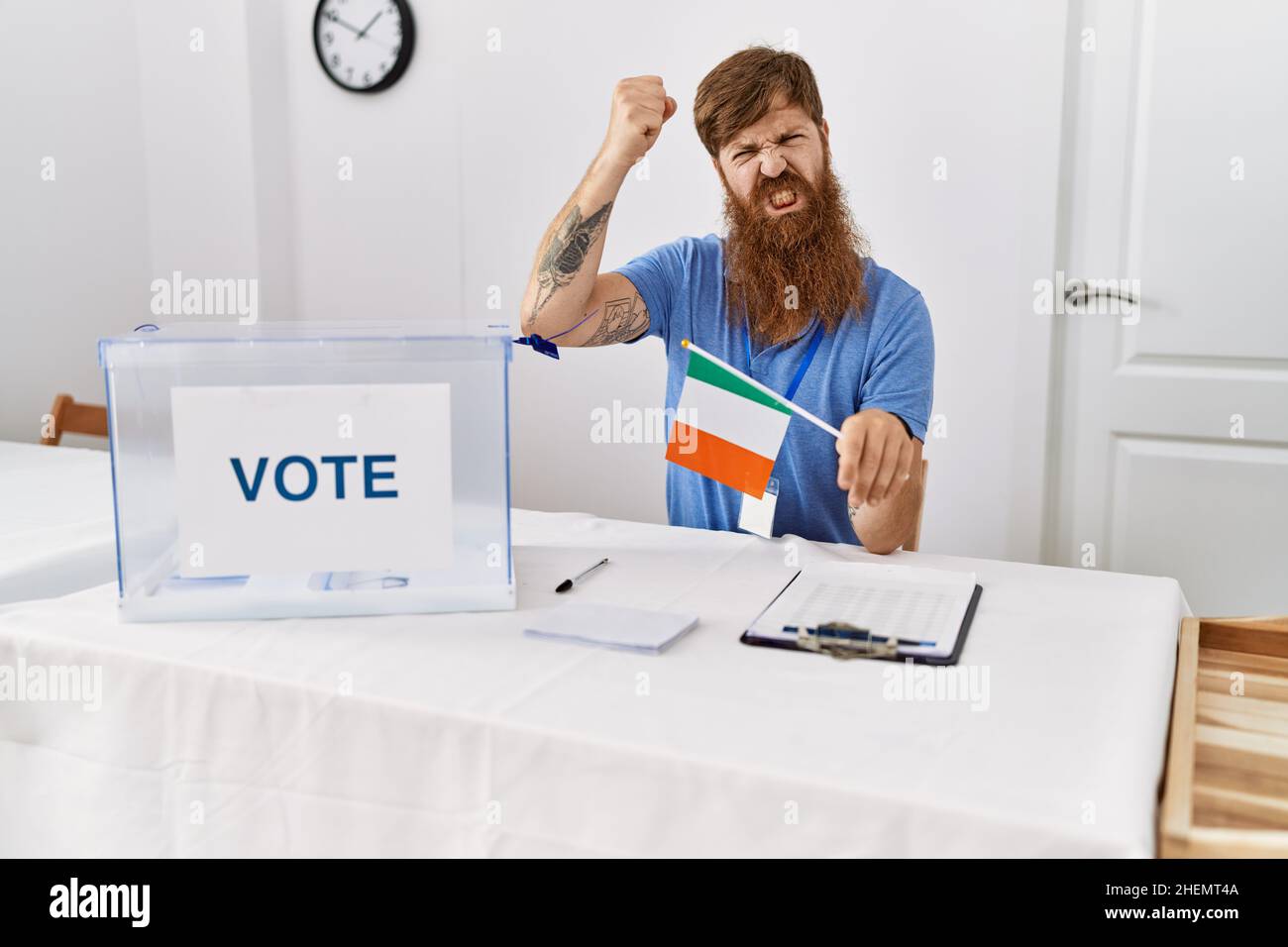 Caucasian man with long beard at political campaign election holding ...