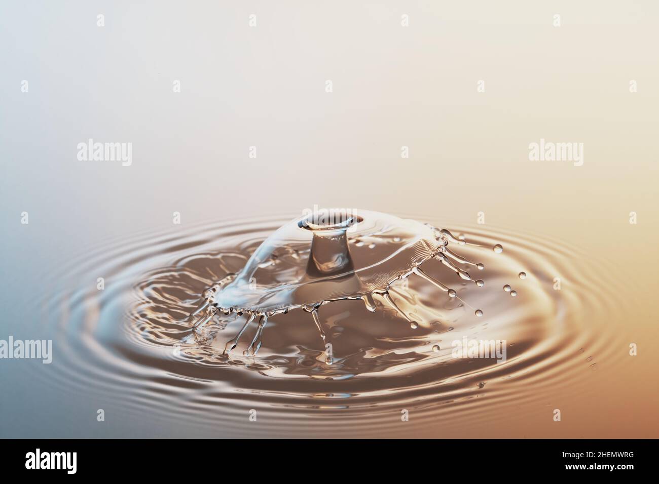 Collision ripple splash of two drops falling into the water Stock Photo ...