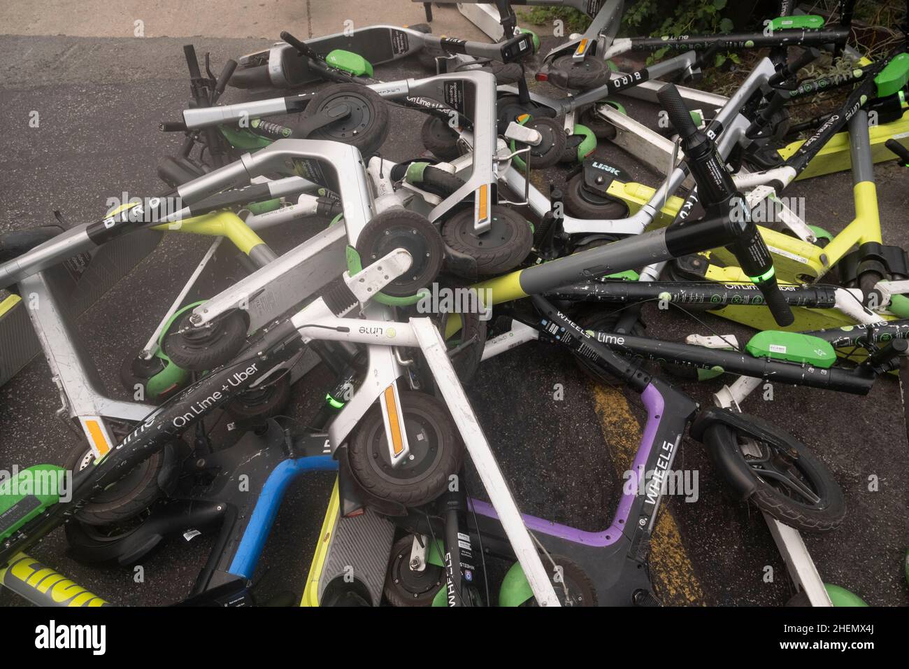 Austin, TX, USA. 10th Oct, 2021. Electric scooters make a haphazard ...
