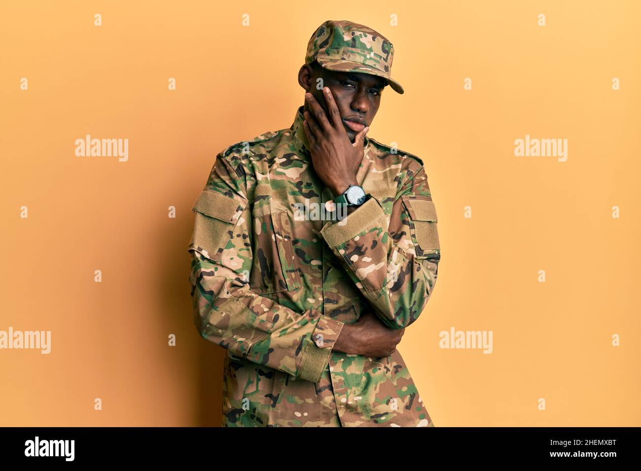 Young african american man wearing army uniform thinking looking tired ...