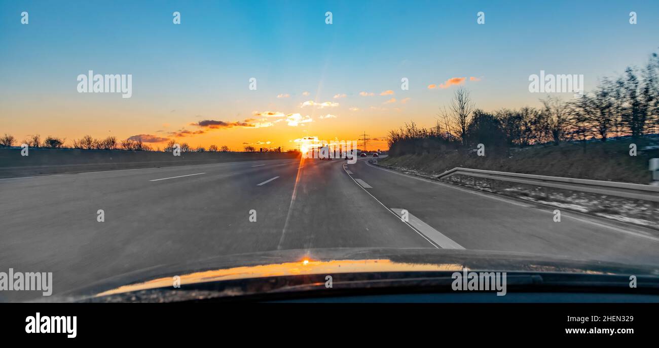 Driving into the sun hi-res stock photography and images - Alamy