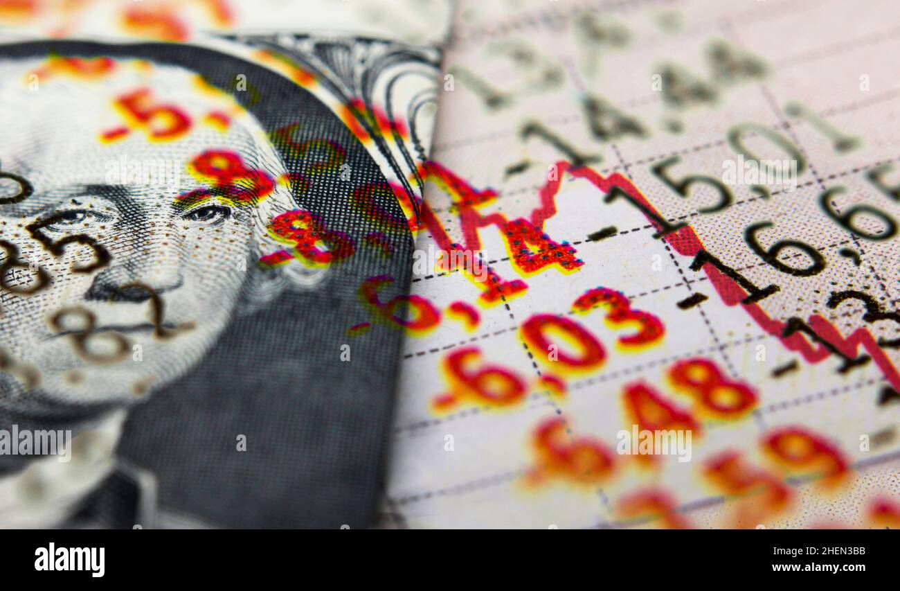 Stock Market Graph next to a US dollar bill. Red trend line indicates ...