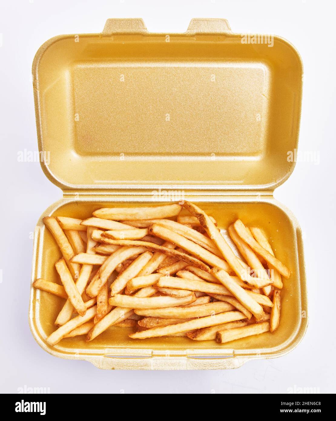Delivery box of french fried potatoes isolated over white background ...