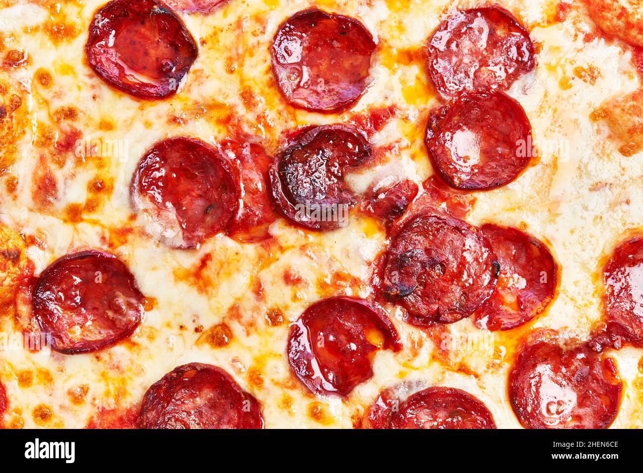 Single pepperoni italian pizza texture Stock Photo - Alamy