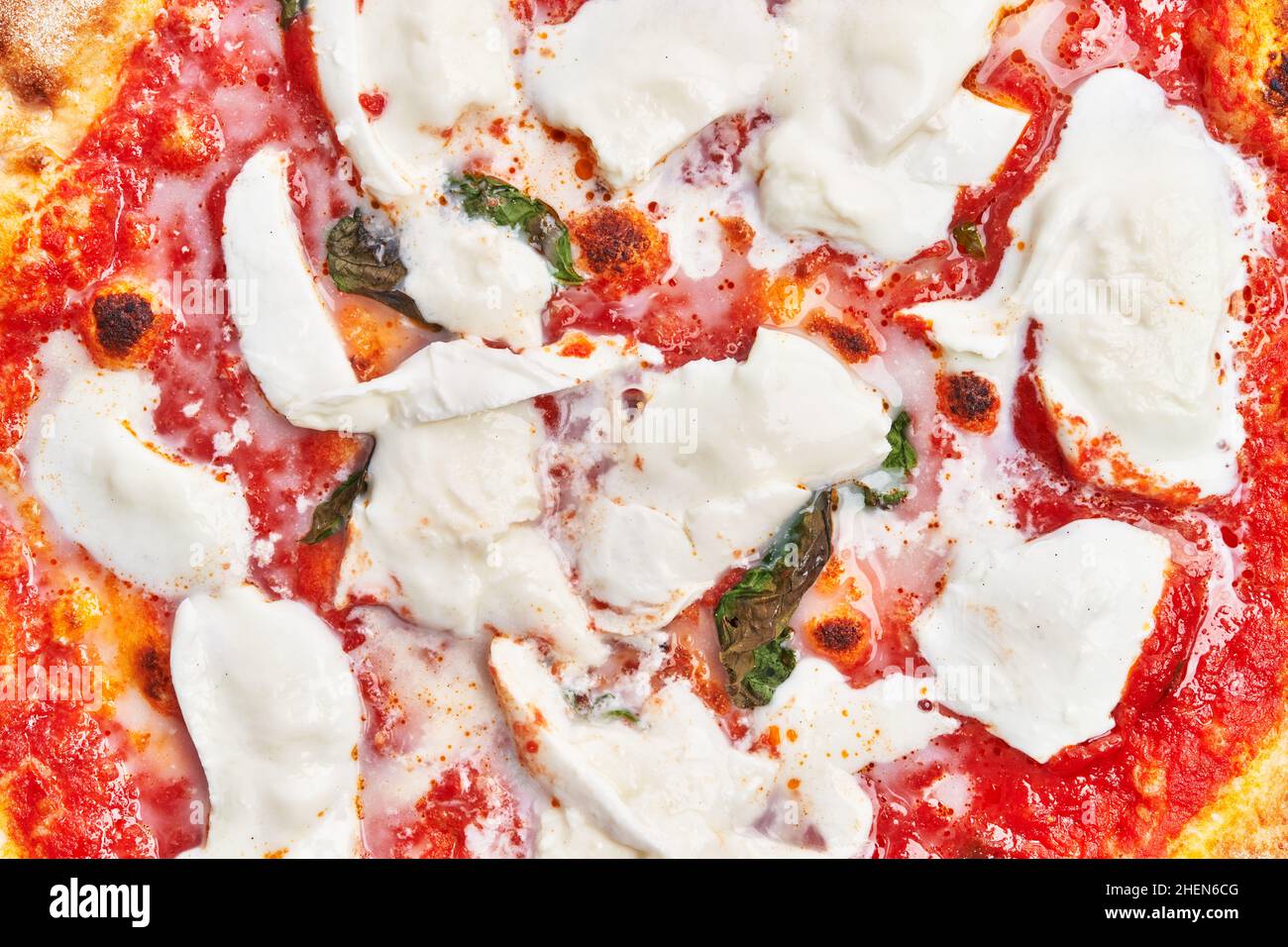Single margherita italian pizza texture Stock Photo - Alamy