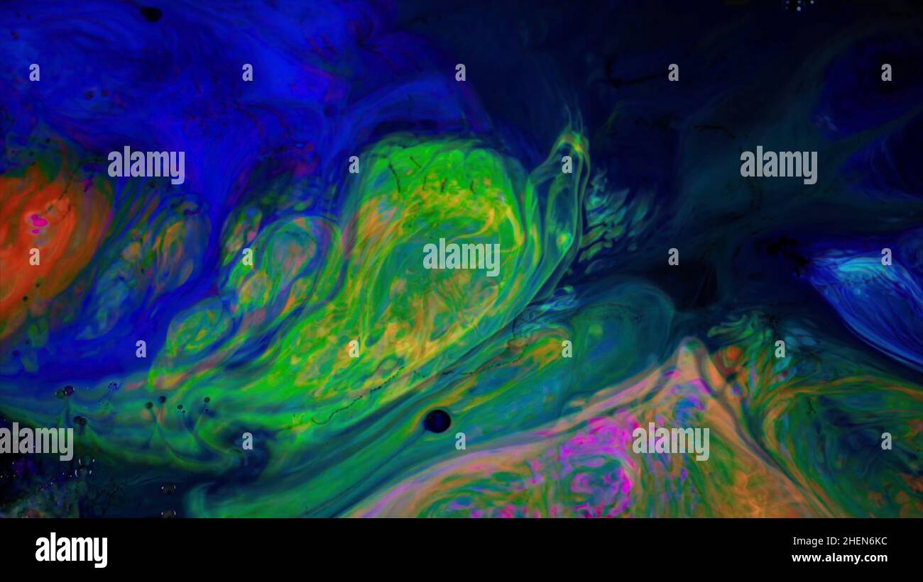 Abstract colorful paint reactions, psychedelic liquid light show, dye ...