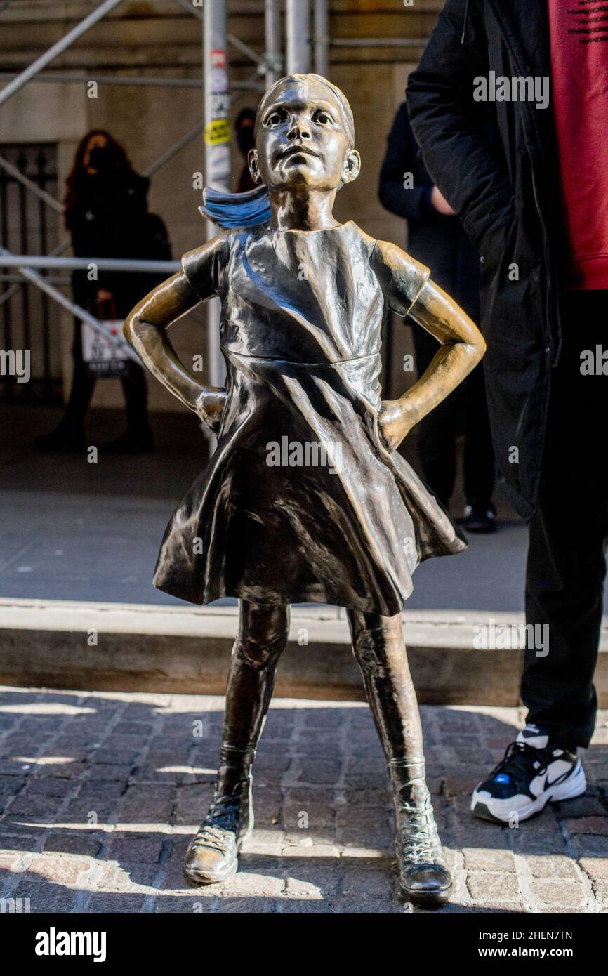 Fearless Girl, a bronze sculpture by Kristen Visbal, outside the New ...