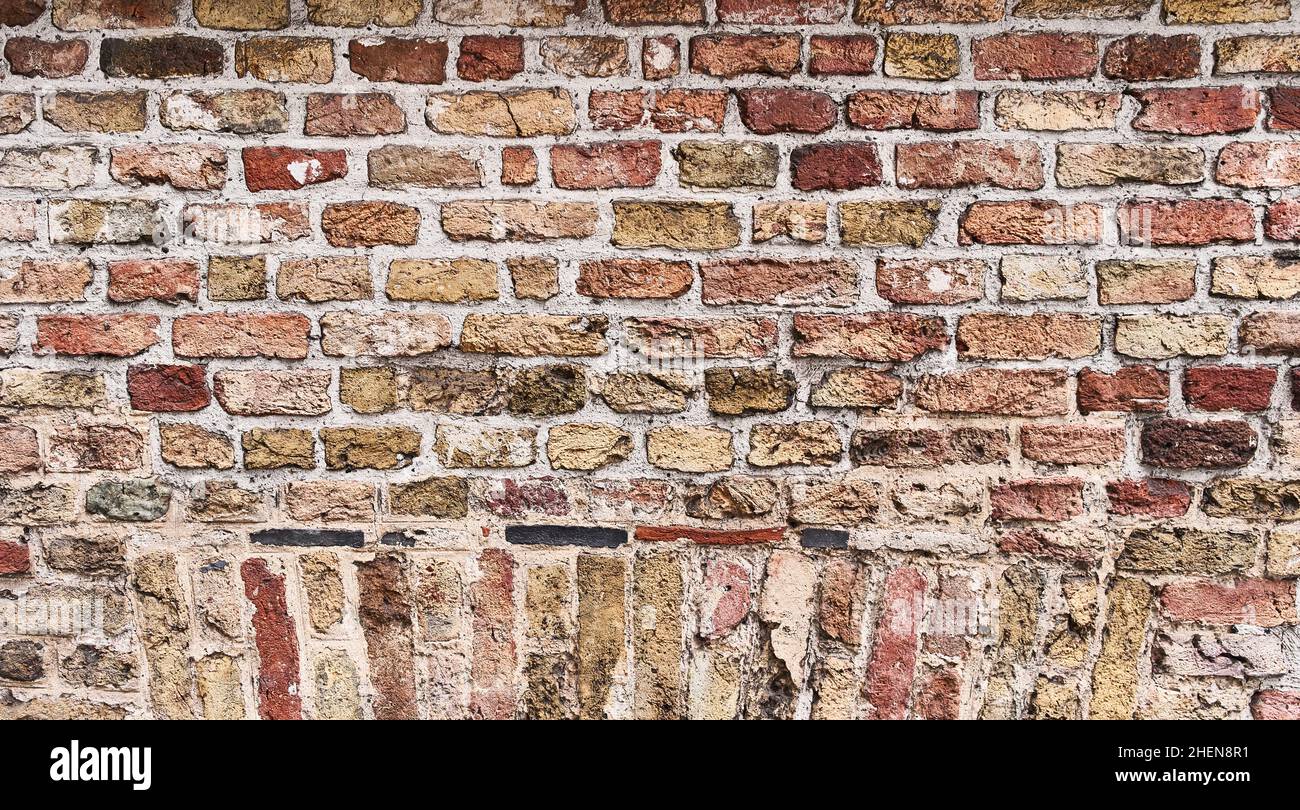 Decay brick wall surface background Stock Photo - Alamy