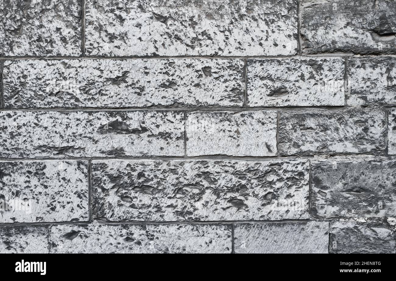 Stone brick wall surface background Stock Photo - Alamy