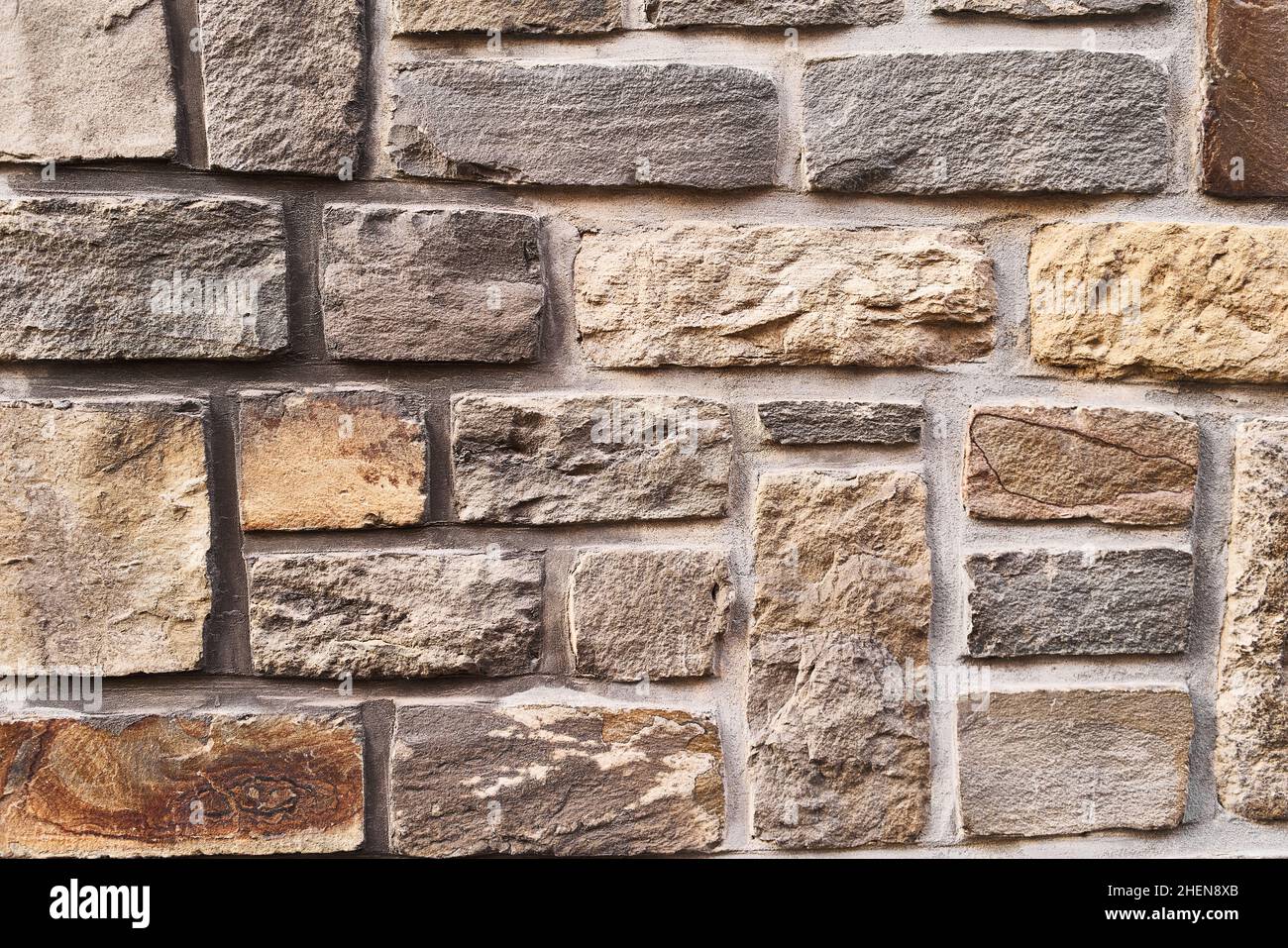 Stone brick wall surface background Stock Photo - Alamy