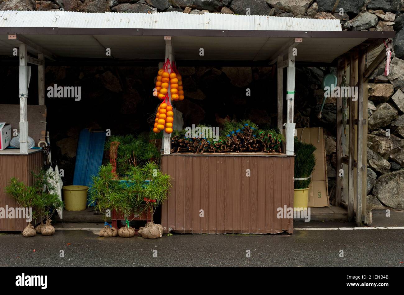A roadside stall on Mount Koya sells offerings of evergreen branches ...