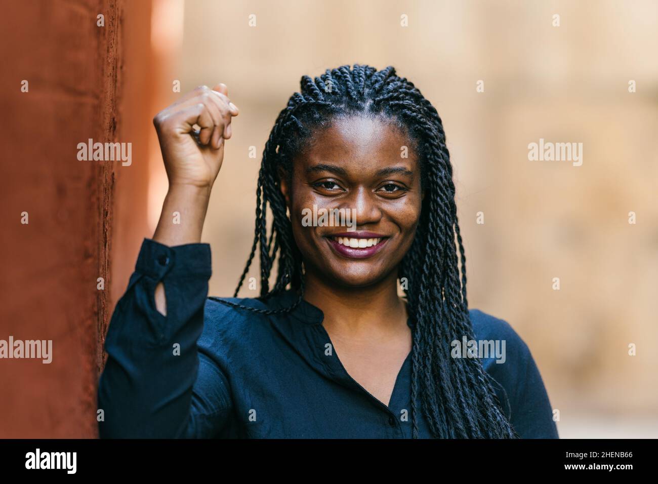 Black woman standing proud pose hi-res stock photography and images - Alamy
