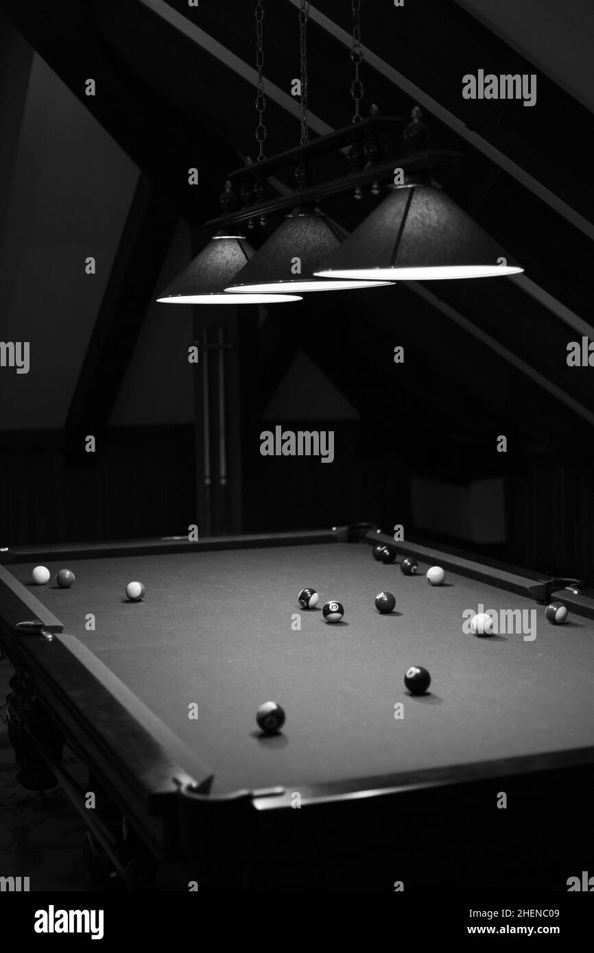 Billiard table in the billiard room with balls and cue Stock Photo - Alamy