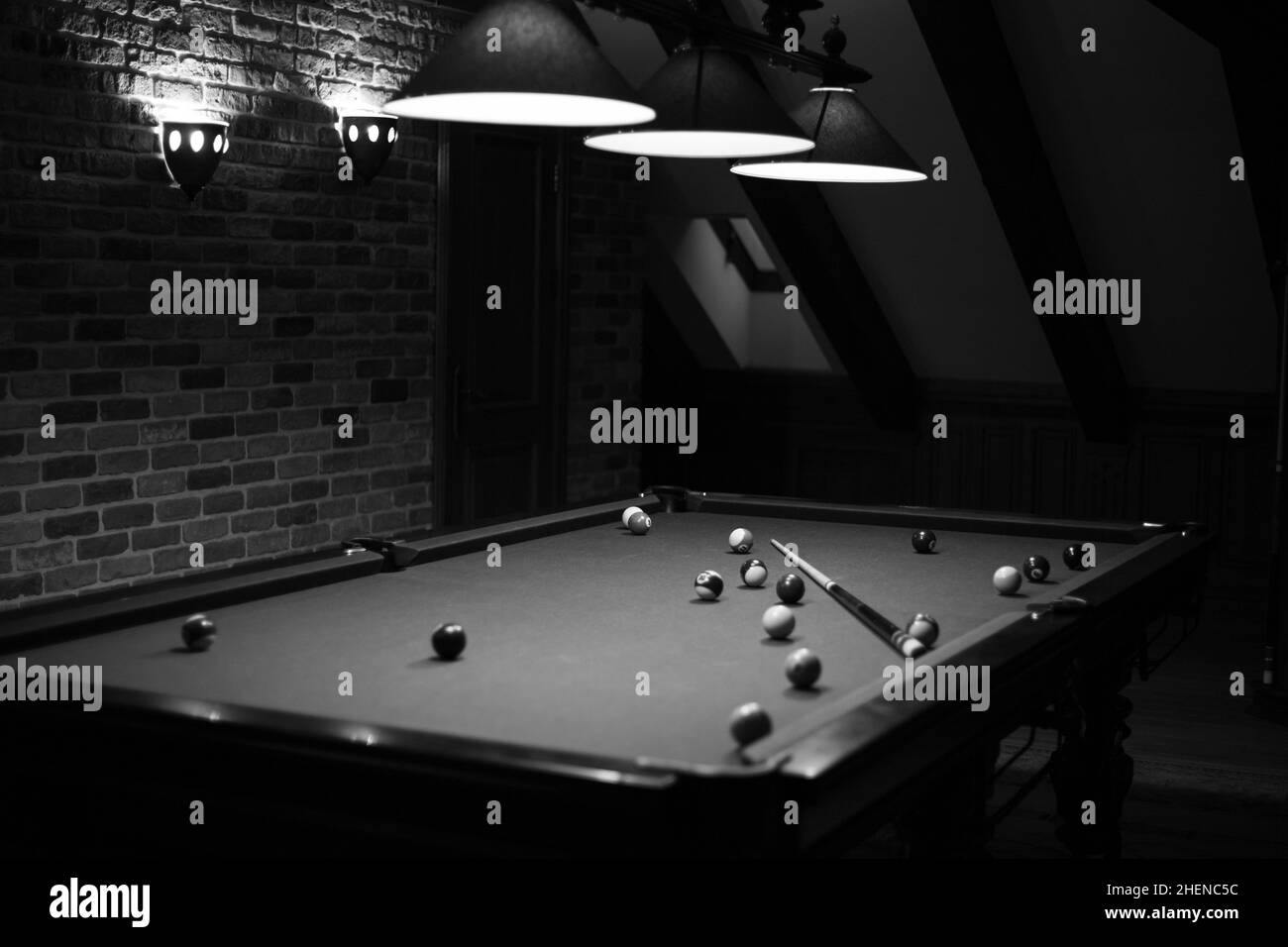Billiard table in the billiard room with balls and cue Stock Photo - Alamy