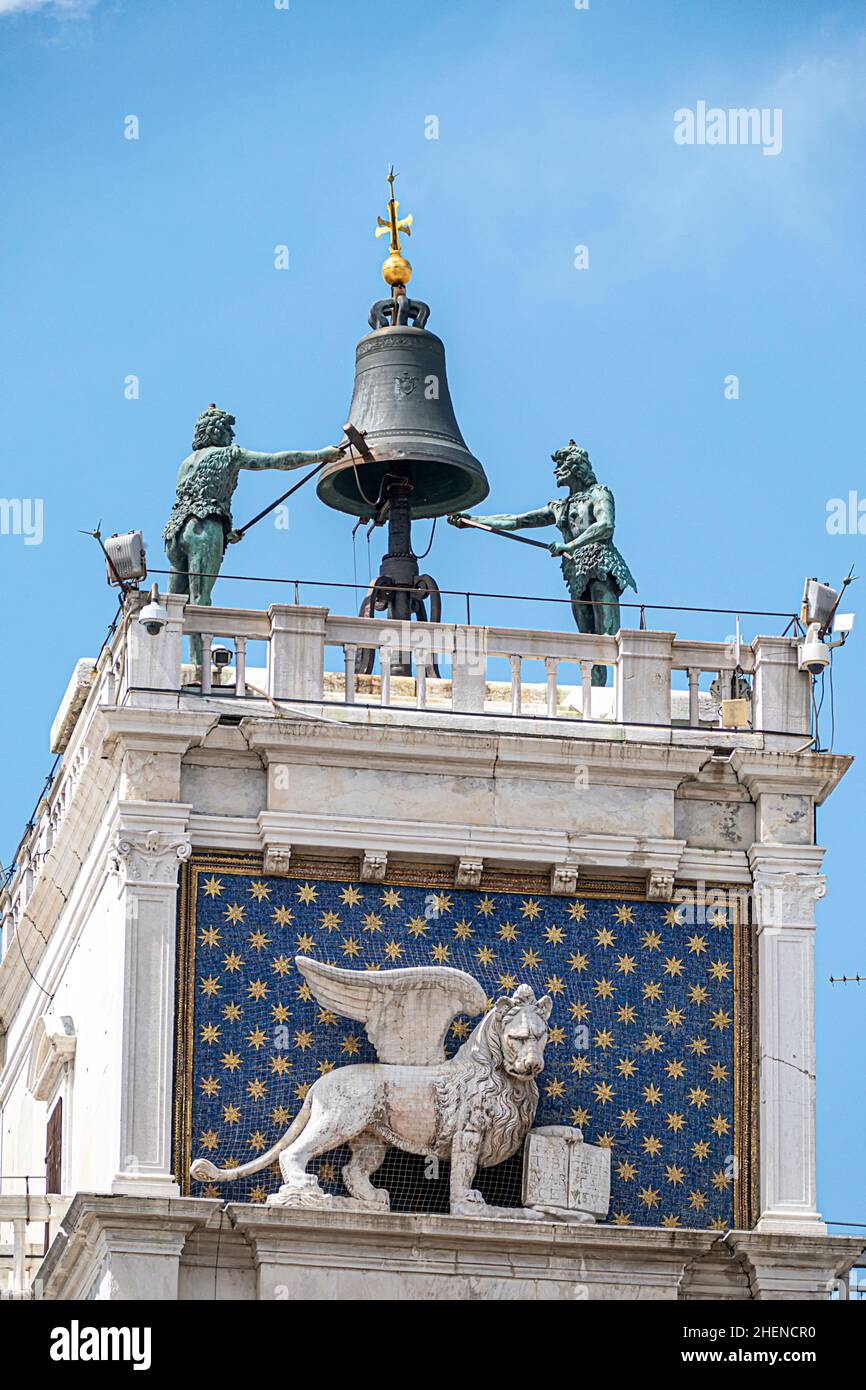 detail of the moors ringing the bell of Venice bell tower with a hammer ...