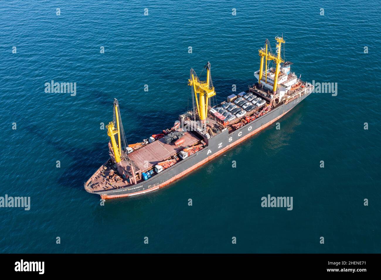 Sea cargo ship loaded with cars and equipment Stock Photo - Alamy