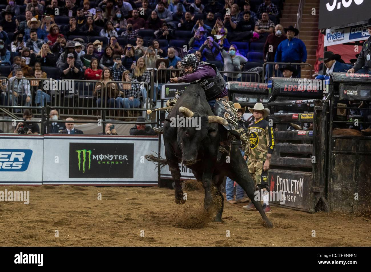 Alex Cardozo rides War Dress during the Professional Bull Riders 2022 ...