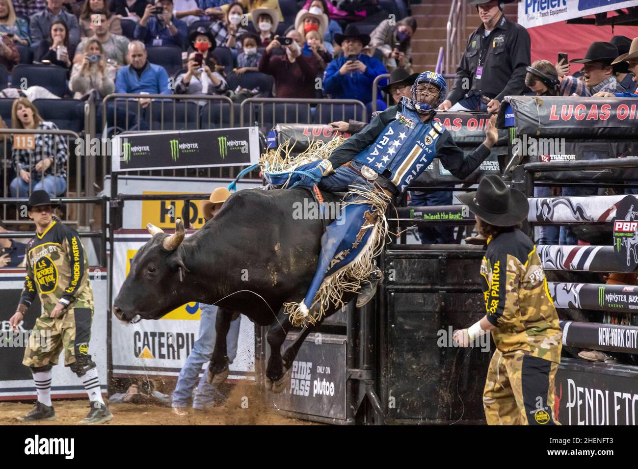 Ezekiel Mitchell rides Big Whisky during the Professional Bull Riders ...
