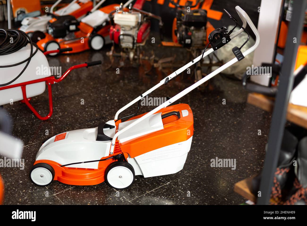 New lawn mower at a garden tool store close up Stock Photo - Alamy