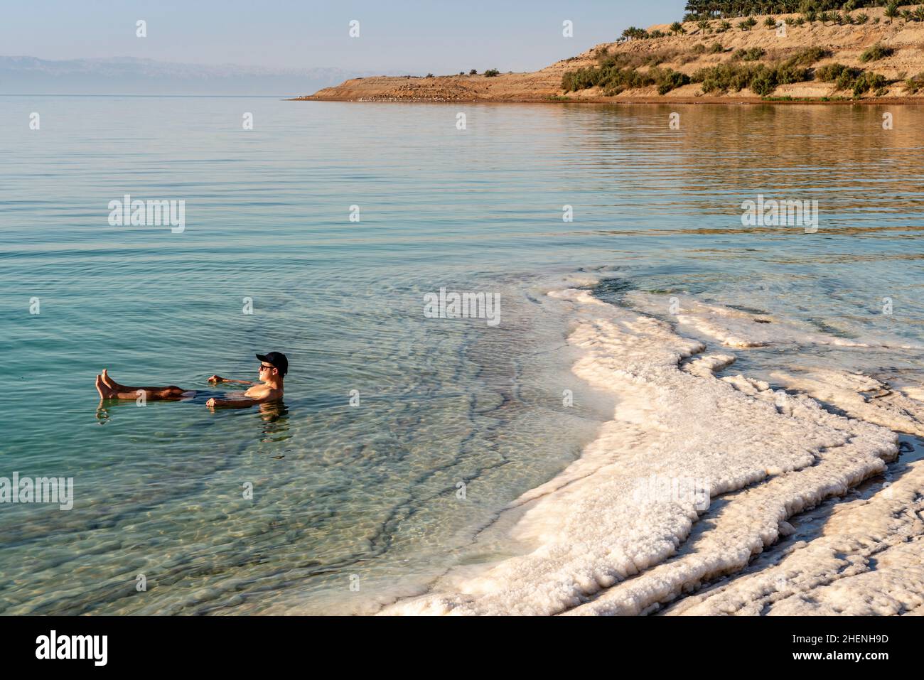 A Young Tourist Floating On The Dead Sea, Jordan, Asia Stock Photo - Alamy