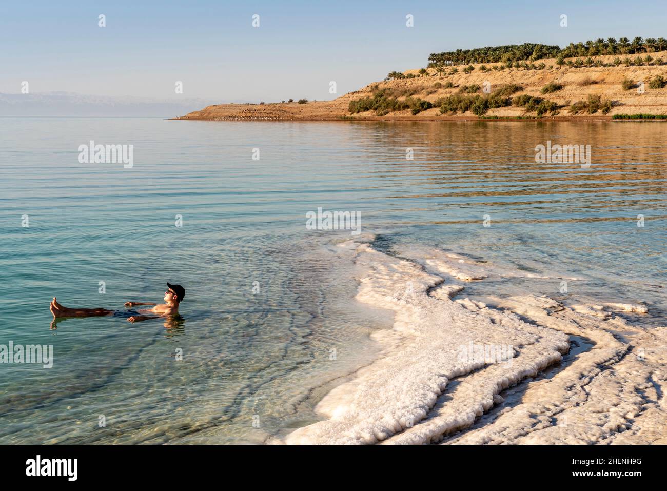A Young Tourist Floating On The Dead Sea, Jordan, Asia Stock Photo - Alamy