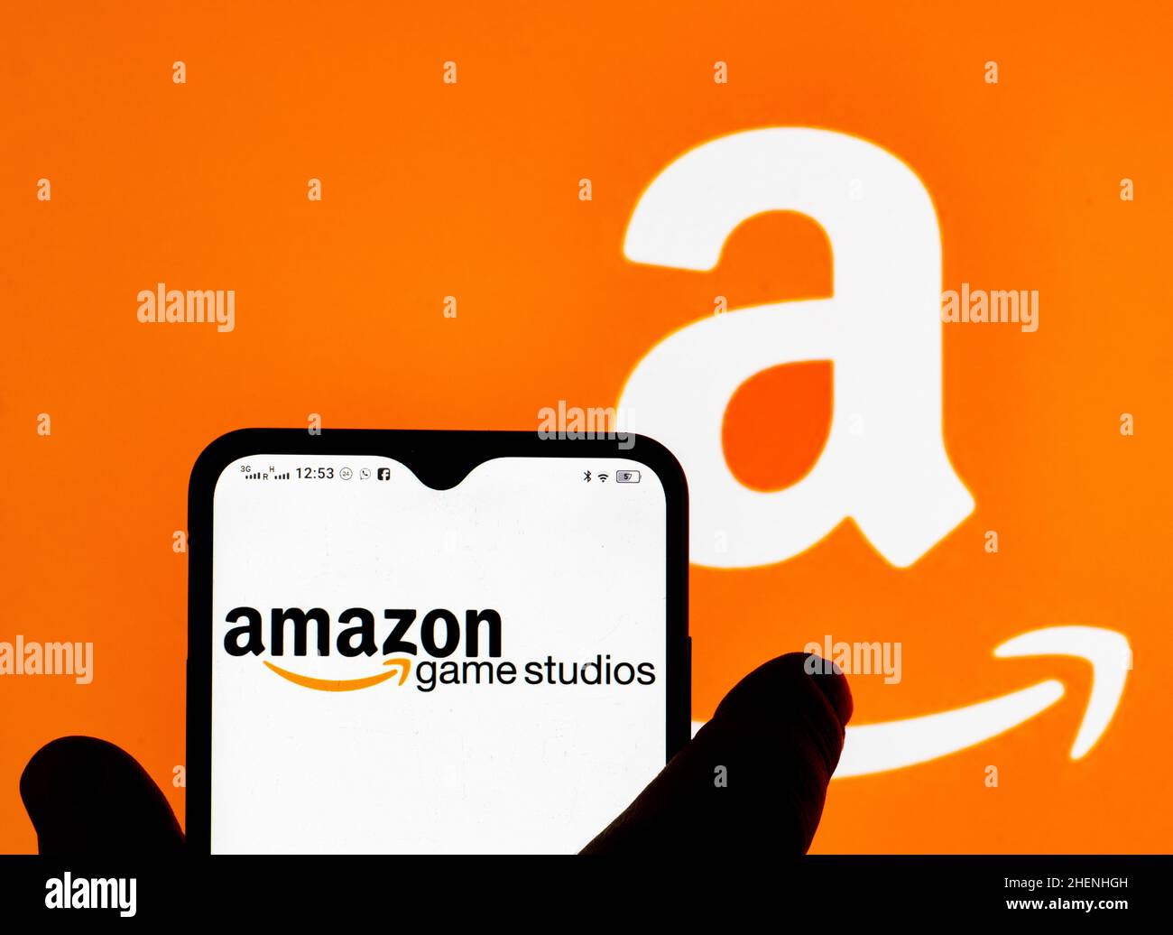 In this photo illustration Amazon Game Studios logo seen displayed on a ...