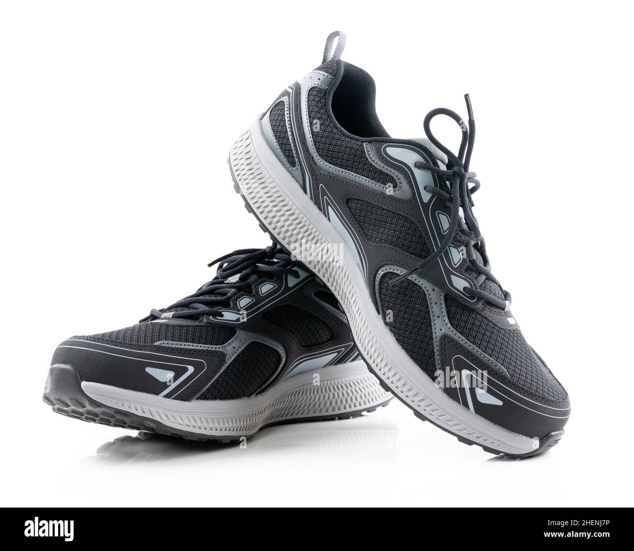 Pair of black sport shoes isolated on white background Stock Photo - Alamy