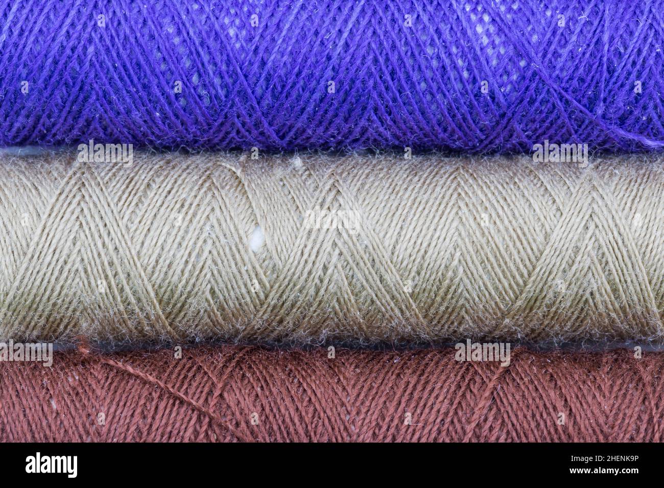 Color thread spool isolated on white background Stock Photo - Alamy