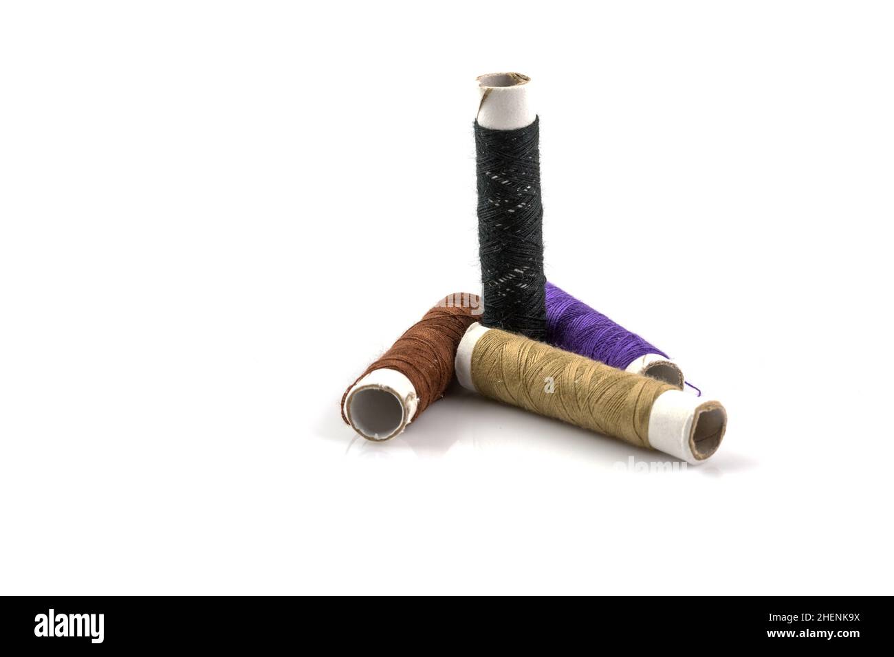 Color thread spool isolated on white background Stock Photo - Alamy