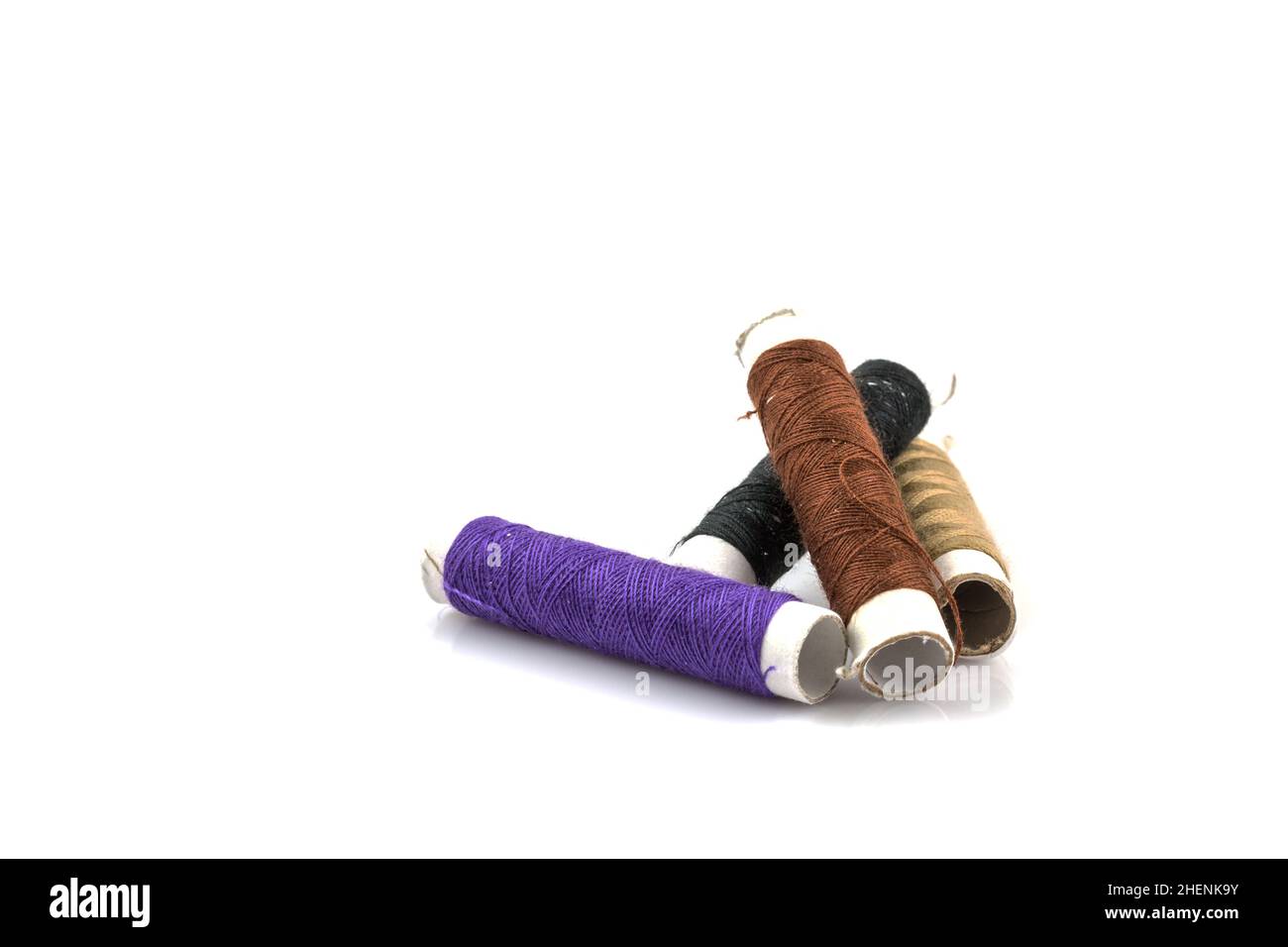 Color thread spool isolated on white background Stock Photo - Alamy