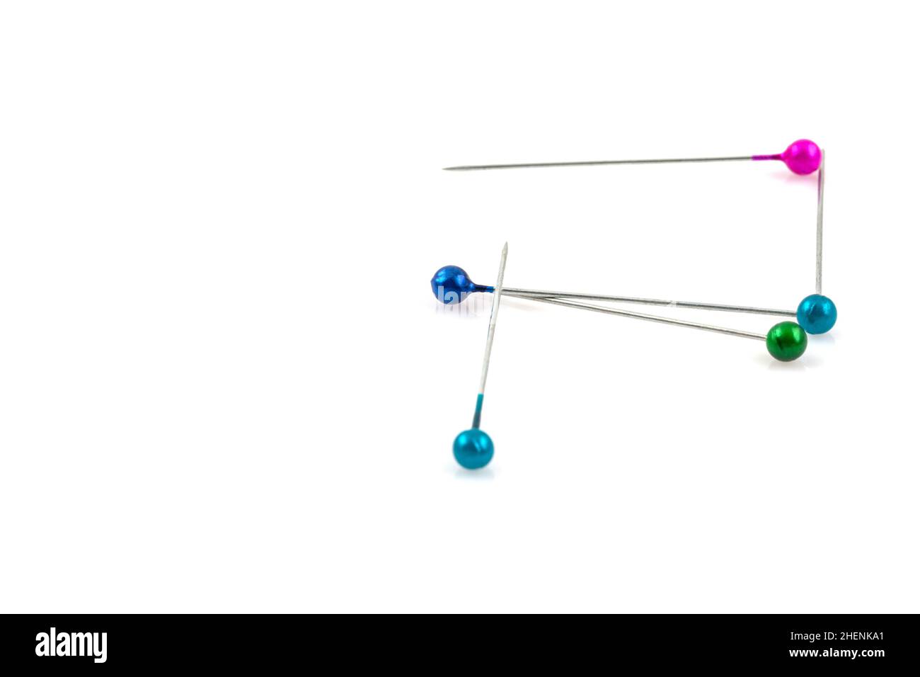 Color sewing push pins isolated on white background Stock Photo - Alamy