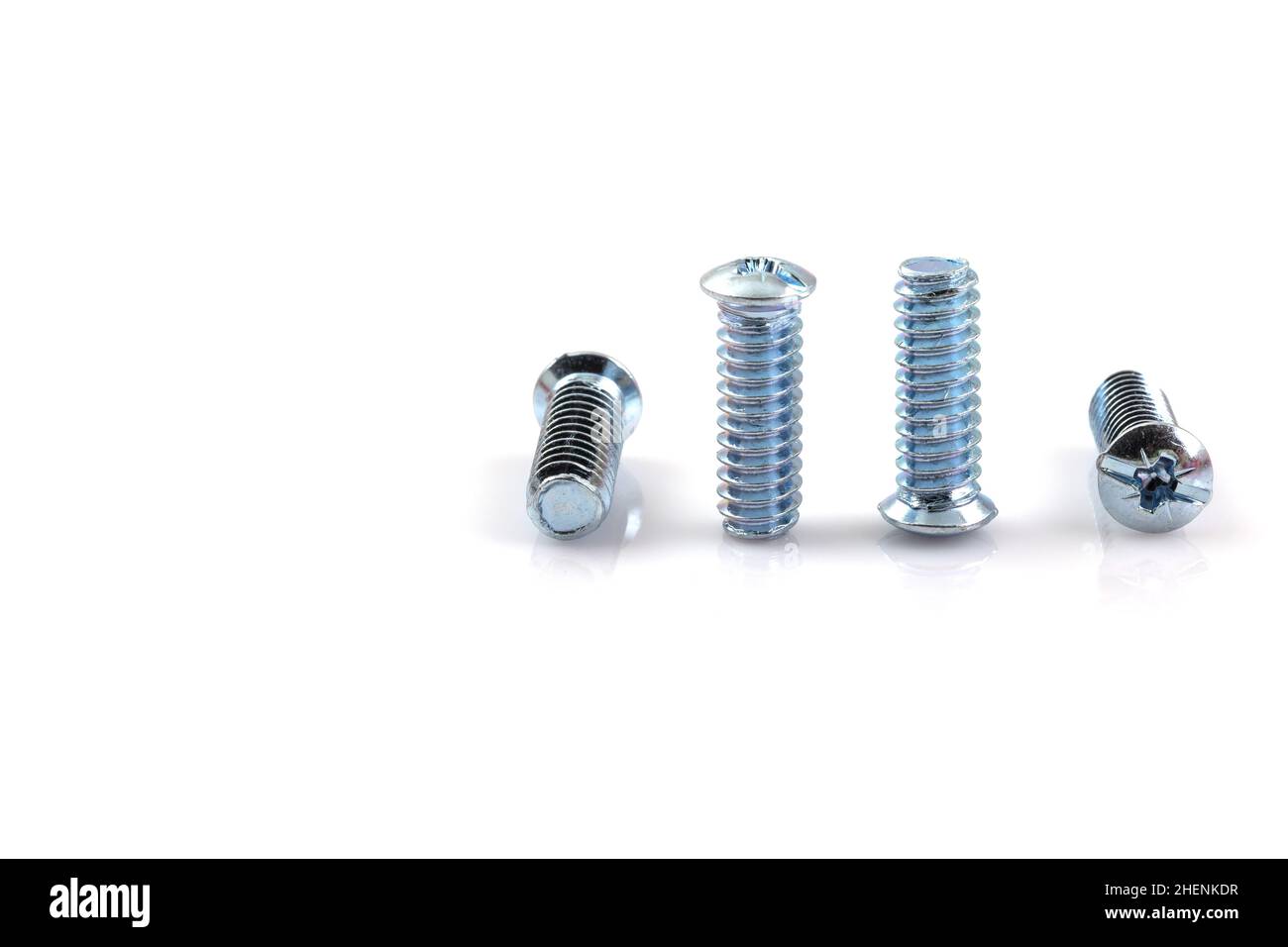 screwed screws nuts against isolated on white background Stock Photo ...
